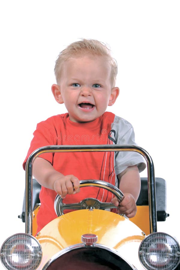 Little boy driving toy car stock photo. Image of steering - 8431154