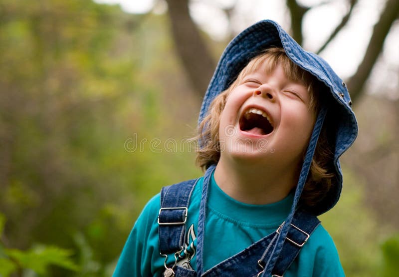Blond boy are laughing stock image. Image of childhood - 5311447