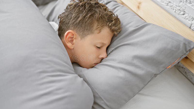 Blond Boy Lying on Bed Sleeping at Bedroom Stock Image - Image of ...