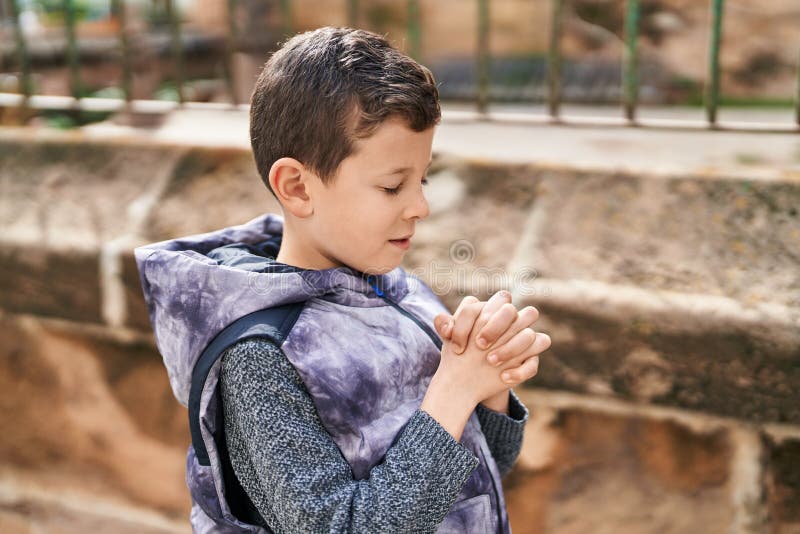 Blond Child Smiling Confident Praying at Street Stock Image - Image of ...