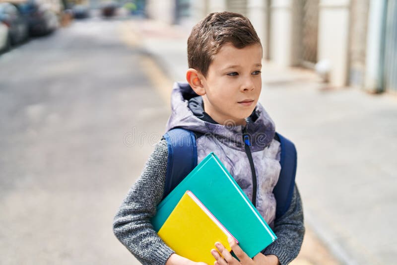 Blond Child Student Holding Books Standing at Street Stock Photo ...