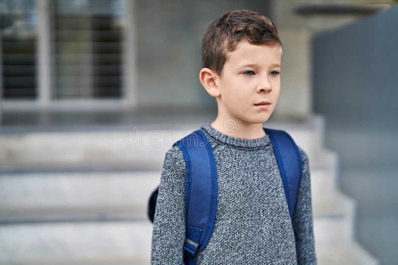 Blond Child Student Standing with Serious Expression at School Stock ...