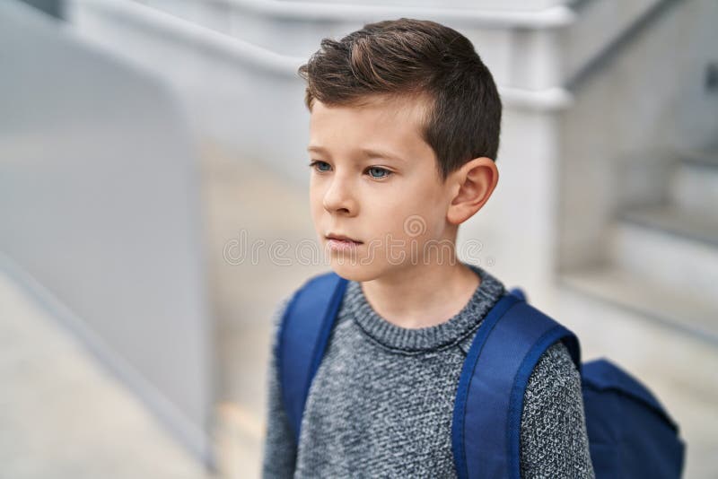 Blond Child Student Standing with Serious Expression at School Stock ...