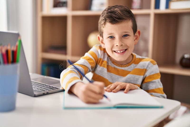 Blond Child Studying Sitting on Table at Home Stock Image - Image of ...