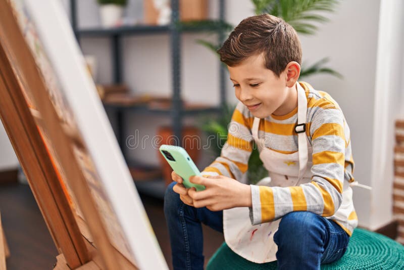 Blond Child Using Smartphone Drawing at Art Studio Stock Photo - Image ...