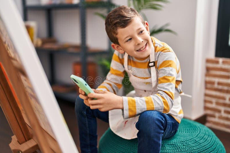 Blond Child Using Smartphone Drawing at Art Studio Stock Image - Image ...
