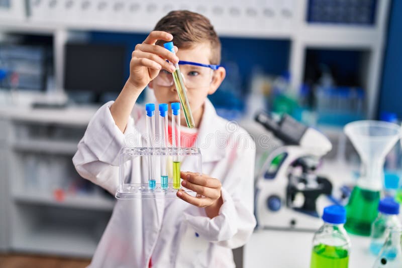 Blond Child Wearing Scientist Uniform Holding Test Tubes at Laboratory ...