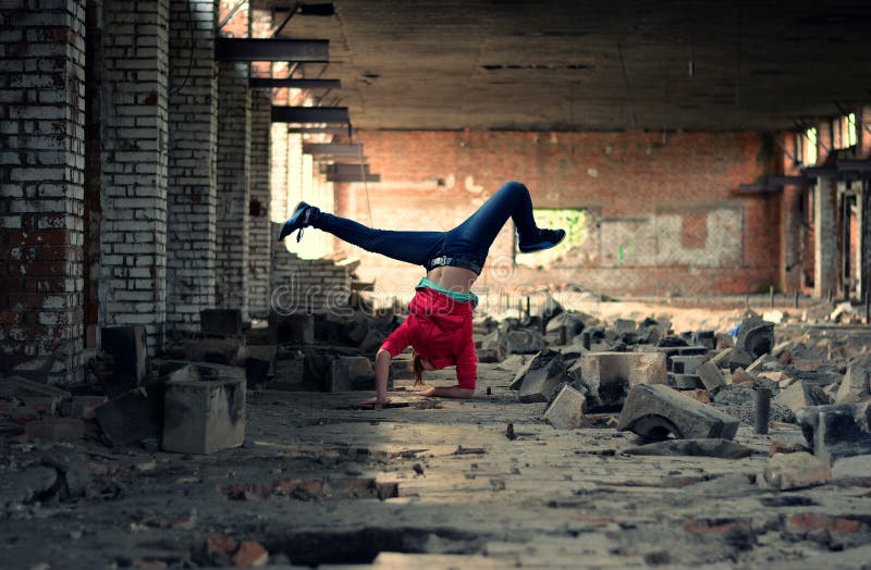 Blond Girl Dancing Break Dance in the Old Brickworks Stock Photo ...