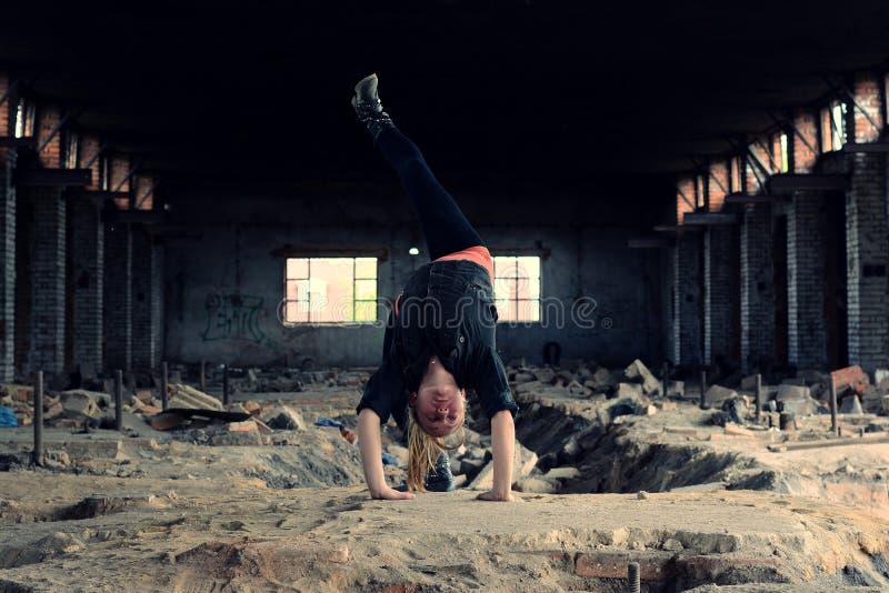 Blond Girl Dancing Break Dance in the Old Brickworks Stock Image ...