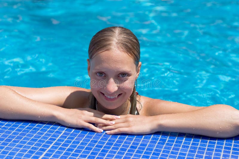 Blond Girl in Swimming Pool Stock Photo - Image of adorable, laughing ...