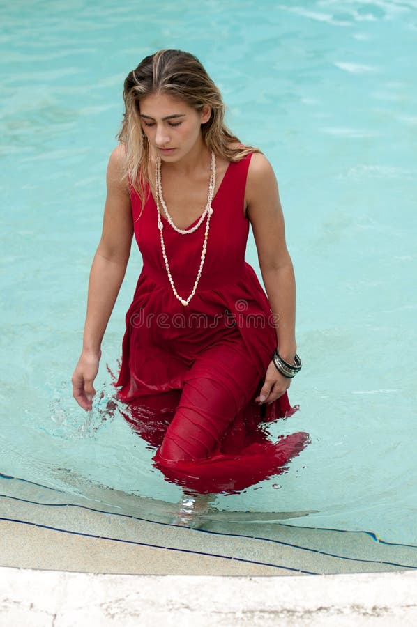 Blond Haired Model Wearing a Swimsuit at a Pool Stock Photo - Image of ...