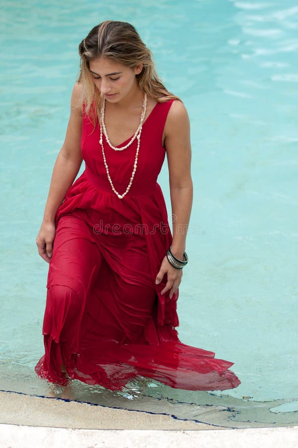 Blond Haired Model Wearing a Swimsuit at a Pool Stock Photo - Image of ...