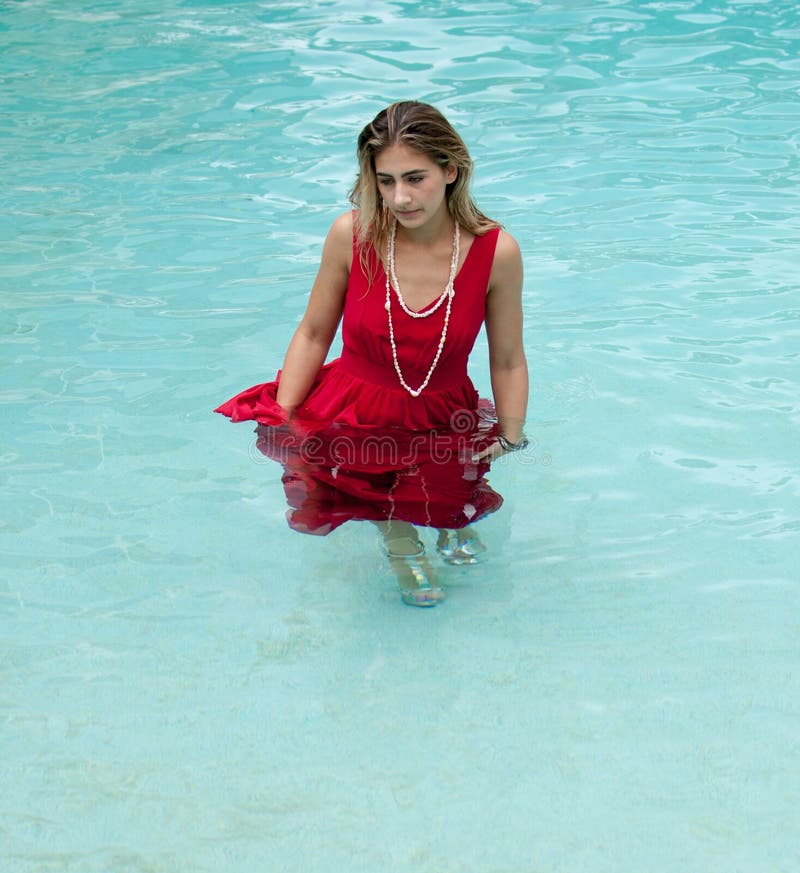 Blond Haired Model Wearing a Swimsuit at a Pool Stock Photo - Image of ...