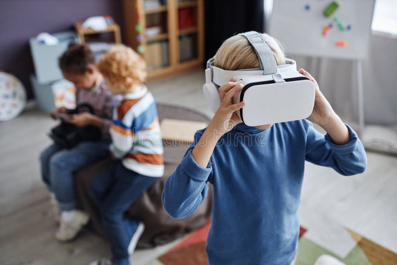 Blond Little Boy in Vr Headset Standing in Front of Camera Stock Photo ...