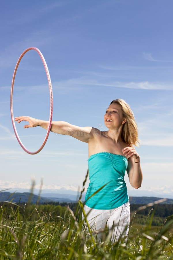 Blond Mature Womanplays with Hula Hoop Stock Photo - Image of happy ...