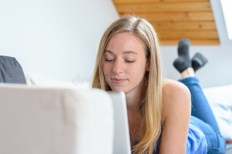 Blond Student Lying on Bed Using Laptop Computer Stock Image - Image of ...