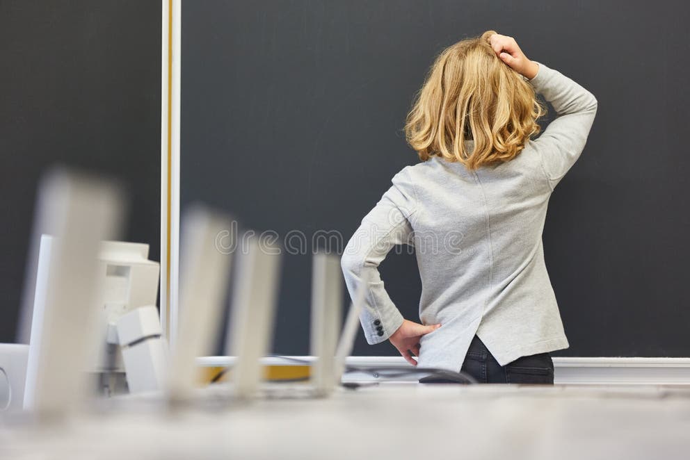 Blond Student Scratching His Head Stock Image - Image of knowledge ...