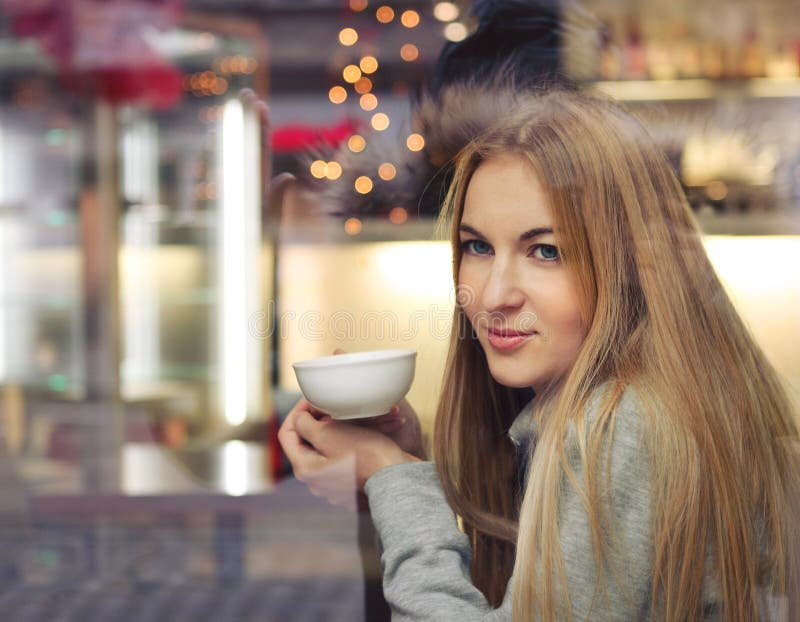 Blond Woman Drinking Tea in Cafe Stock Image - Image of coffee, glass ...