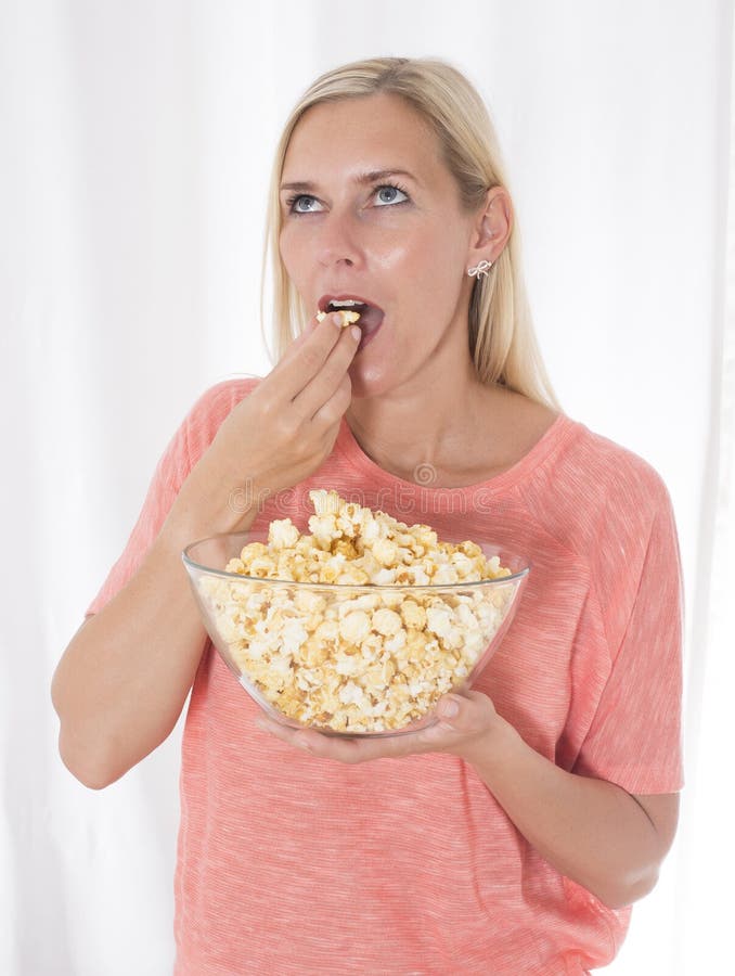 Heavy Woman Watching TV while Eating Junk Food Stock Photo - Image of ...