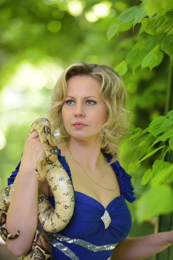 Blond Woman in Elegant Dress with a Python Stock Photo - Image of ... Blond Woman in Elegant Dress with a Python Stock Photo - Image of ...