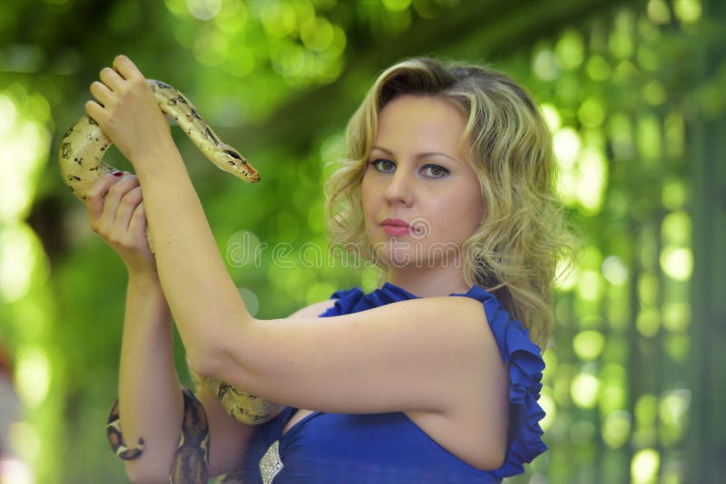 Blond Woman in Elegant Dress with a Python Stock Image - Image of hair ... Blond Woman in Elegant Dress with a Python Stock Image - Image of hair ...