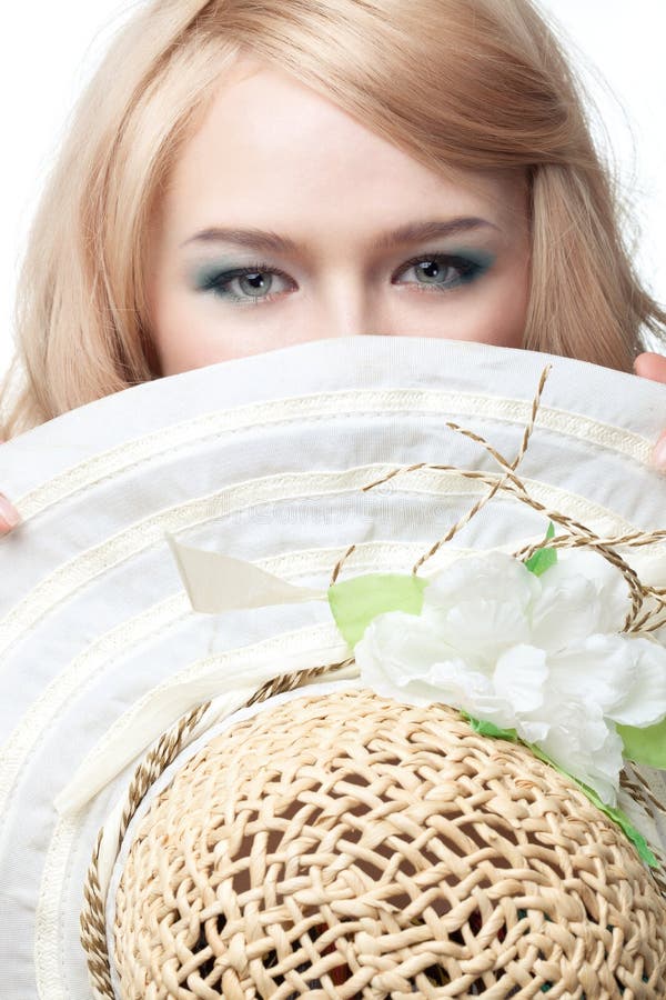 Blond Woman Looking Behind Hat Stock Image - Image of happy, model ...