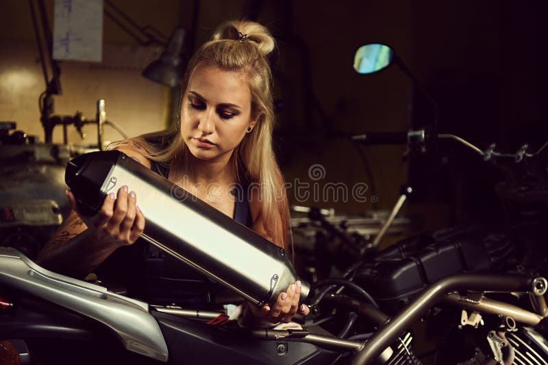 Blond woman mechanic stock photo. Image of maintenance - 78358020