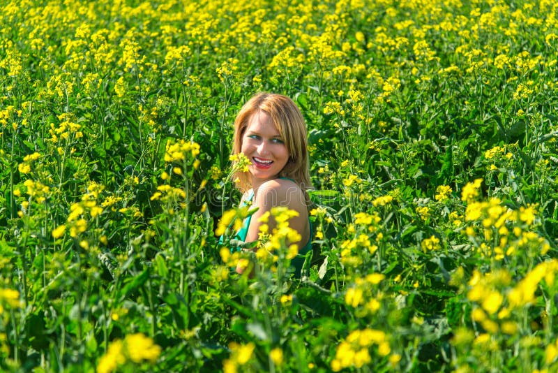 Blond woman in a field stock photo. Image of sensuality - 42315236