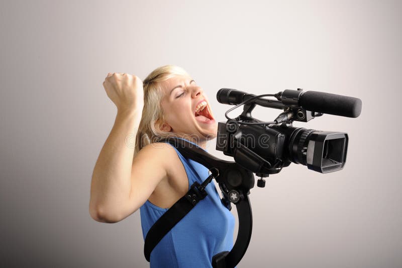 Blond Woman With Video Camera Stock Image - Image of business, pride ...