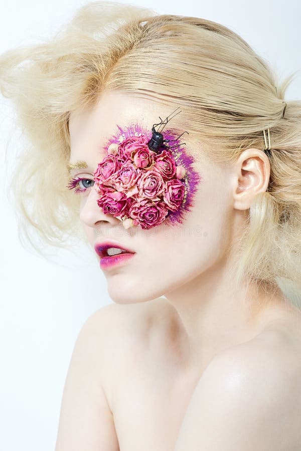 Blond Young Girl with Flowers on Face Stock Photo - Image of indoors ...