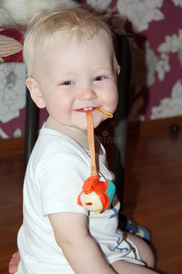 Blonde baby boy in home stock image. Image of closeup - 74731463