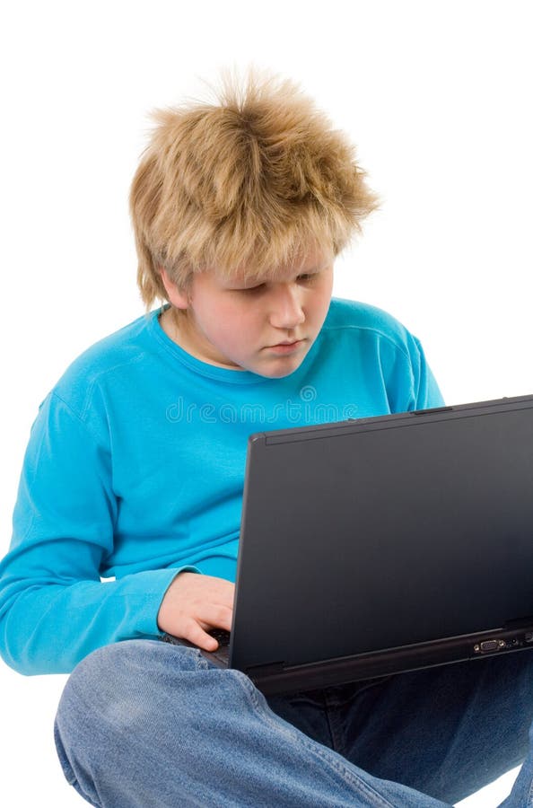 Boy working on a laptop stock image. Image of searches - 802581