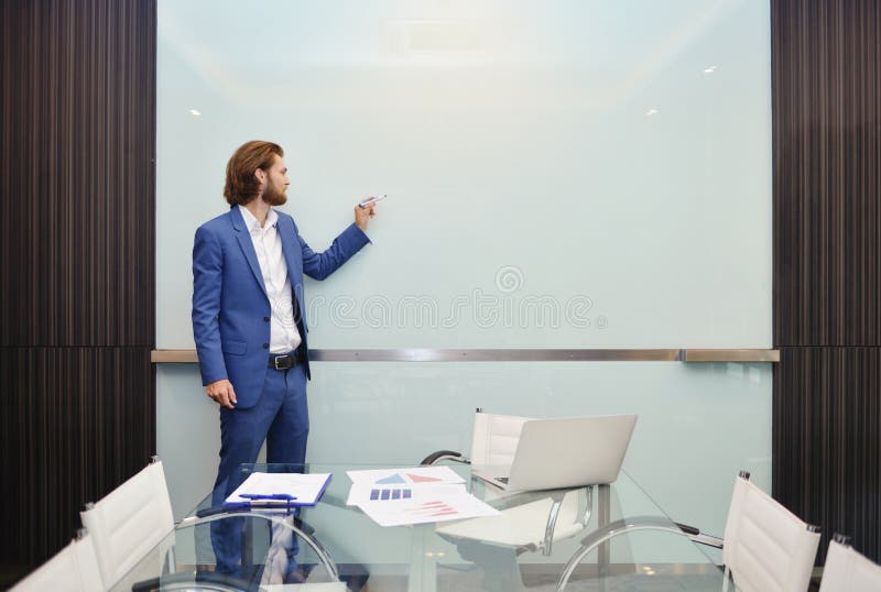 Blonde Business Man Presenting a Project on Blank Glass Board Stock ...
