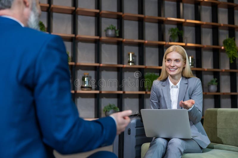 Blonde Business Woman Having an Interview with a Work Candidate and ...