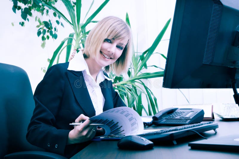 Blonde Businesswoman Working on Computer at the Office Stock Image ...