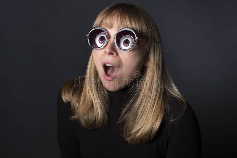 Blonde Female in Funny Glasses Expressing Shock Stock Image - Image of ...
