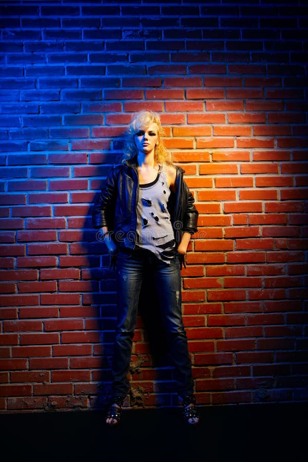 Blonde girl glam rocker stock image. Image of brick, model - 16556315