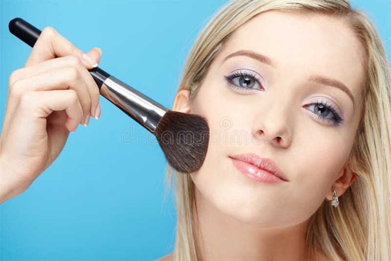 Blonde girl making up stock photo. Image of model, attractive - 13651850