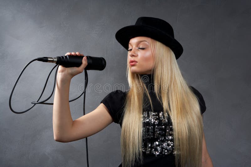 Blonde Girl with Microphone Stock Photo - Image of young, lifestyle ...