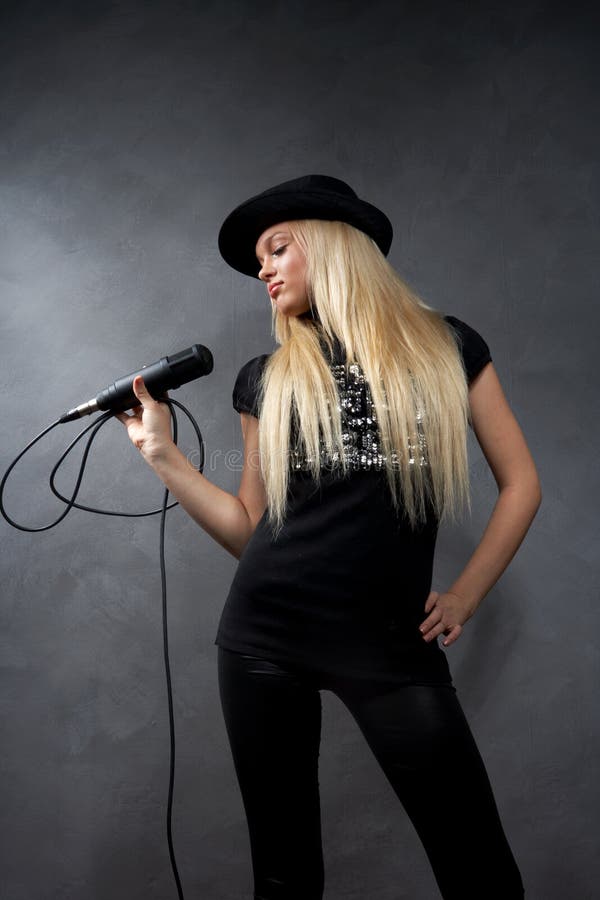 Blonde Girl with Microphone Stock Photo - Image of studio, equipment ...