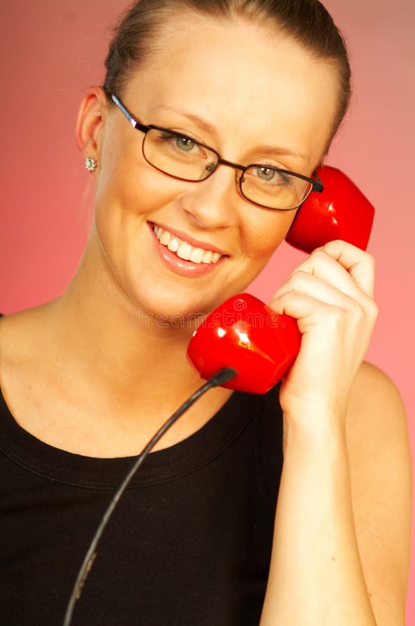 Blonde girl with red phone stock image. Image of cell, honest - 513889