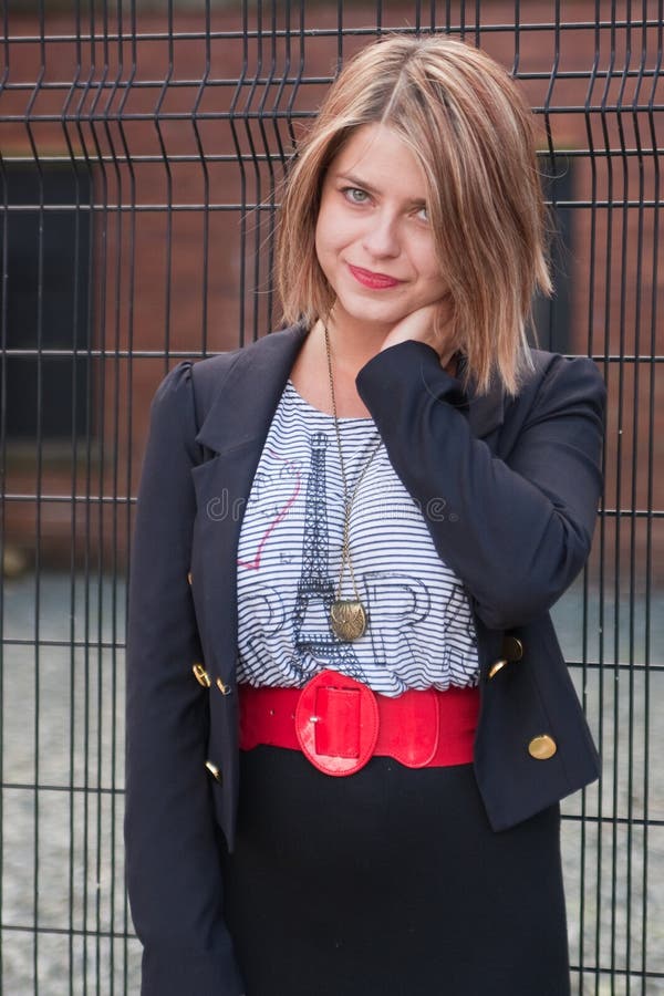 Blonde Girl Waiting at the Prison Gates Stock Photo - Image of ...