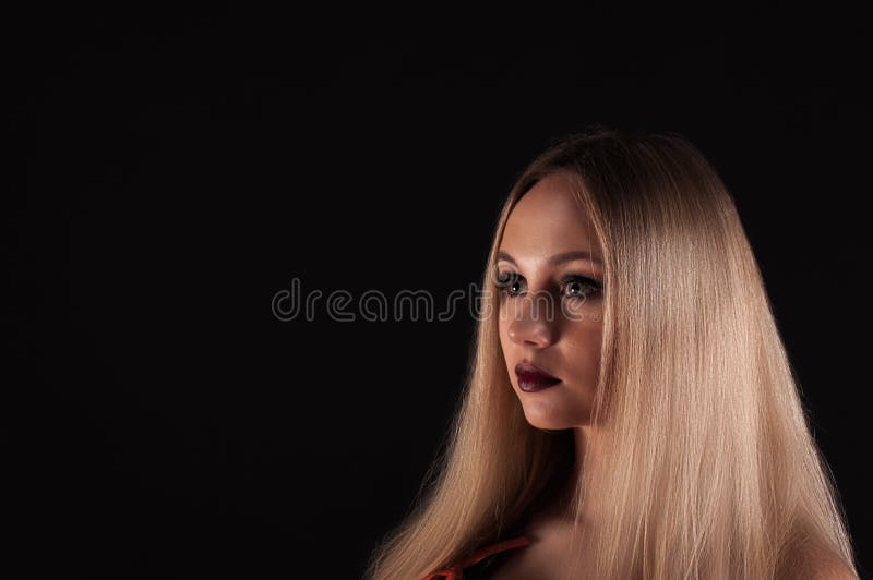 A Blonde Gothic Priestess in the Dark. Stock Image - Image of black ...