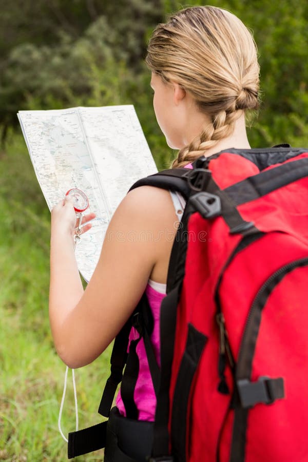 Blonde Hiker with Compass and Reading Map Stock Image - Image of ...