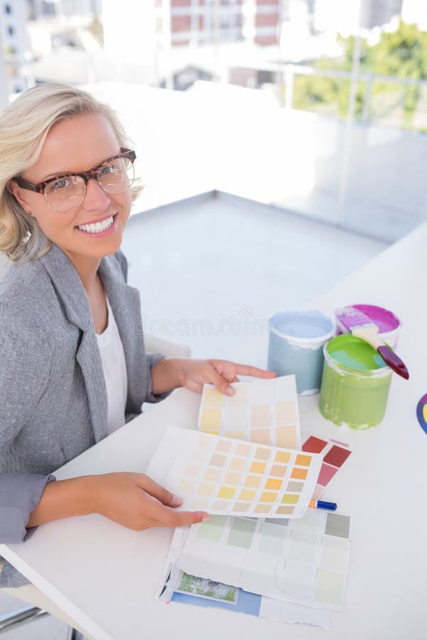 Blonde Interior Designer Holding Colour Charts Stock Photo - Image of ...