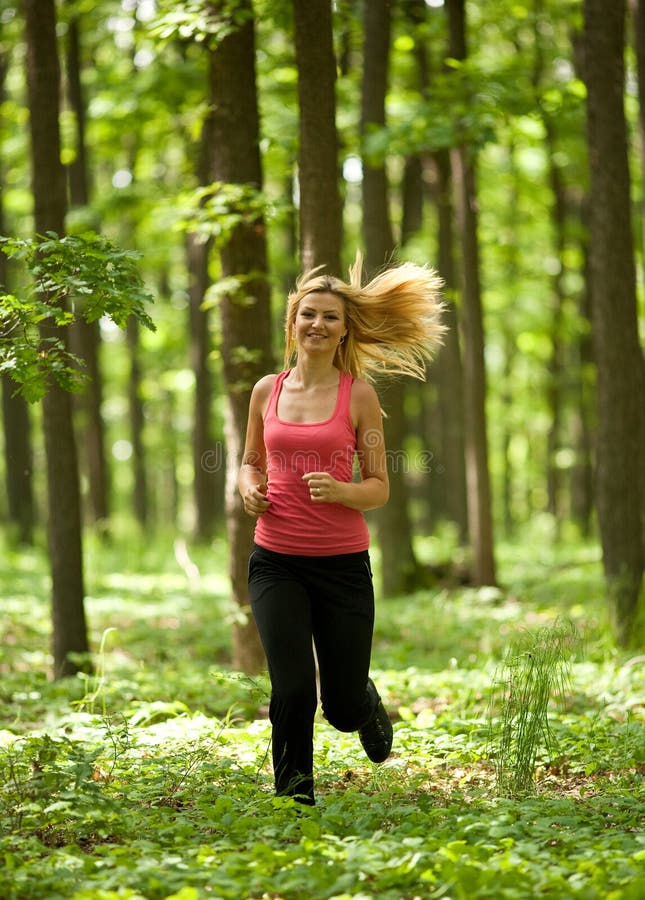 Blonde lady running stock image. Image of outdoor, female - 14540325