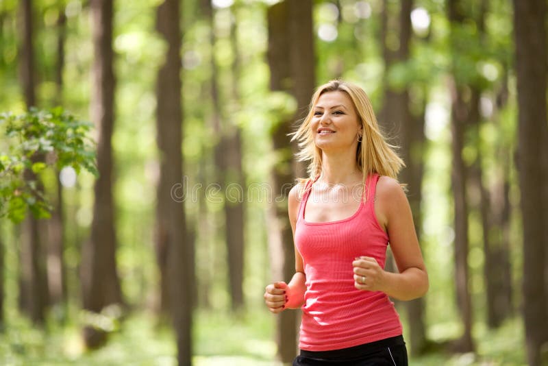 Blonde lady running stock image. Image of outdoor, female - 14540325