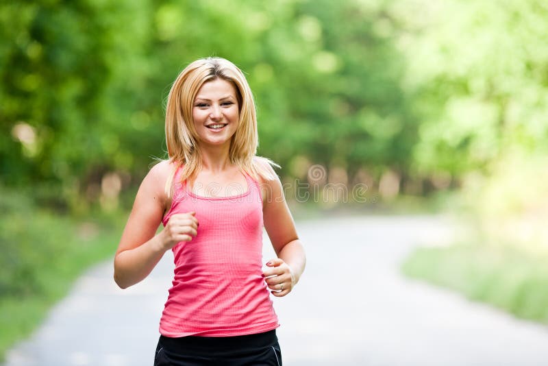 Blonde lady running stock image. Image of person, athlete - 14540333