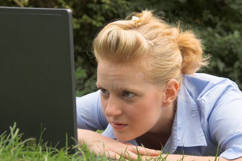 Blonde with laptop stock image. Image of grass, lifestyle - 1346979