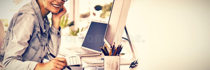 Blonde Pretty Designer Looking at the Camera Using Digitizer Stock ...